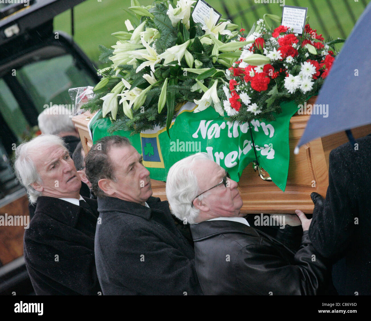 George Bests coffin borne by Derek Dougan, Gerry Armstrong and Billy ...