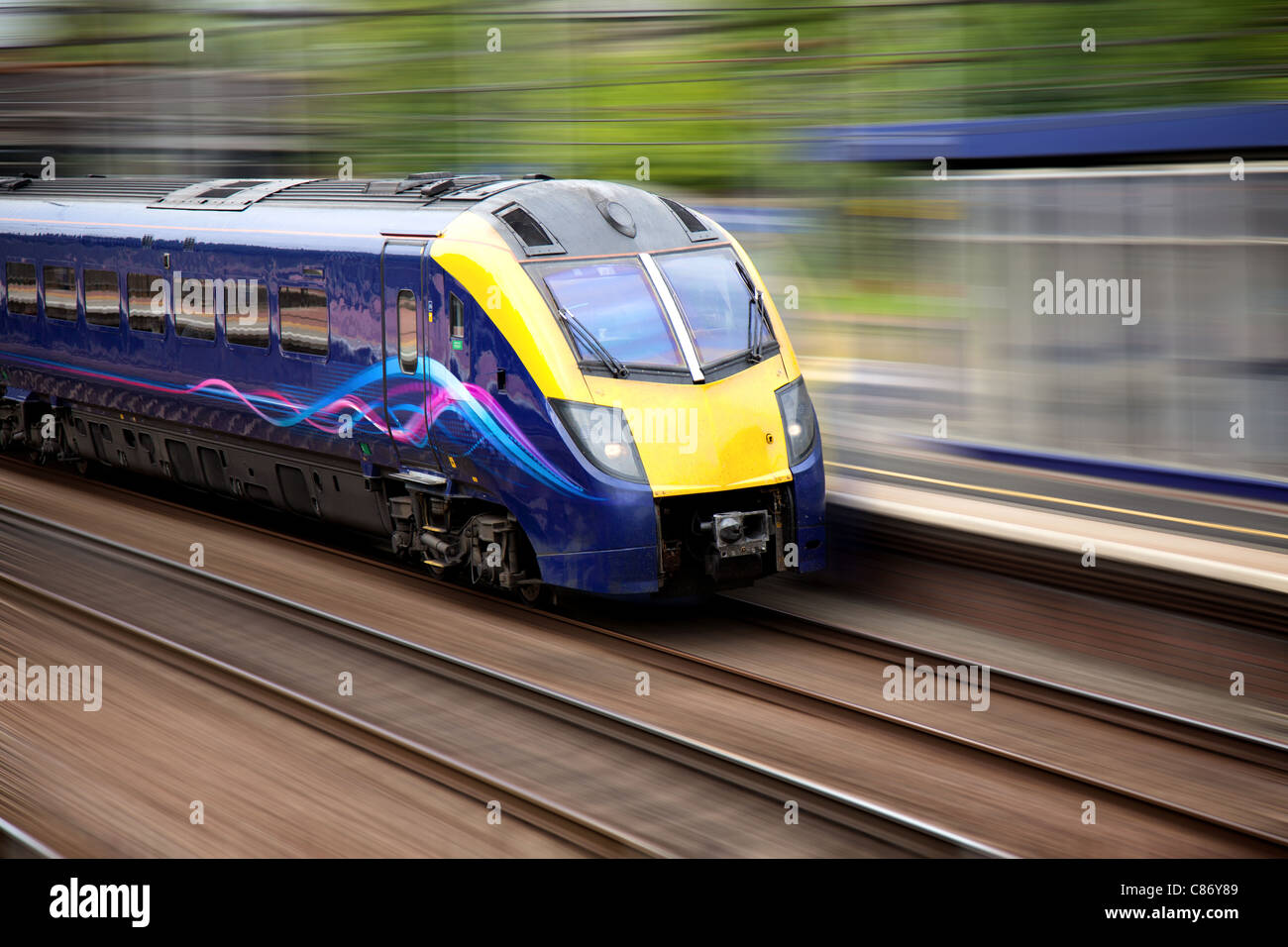Fast moving modern train Stock Photo - Alamy
