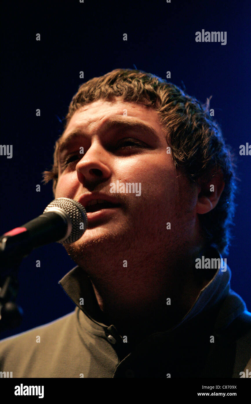 Andy Nicholson, bass guitar with the Arctic Monkeys performs on stage ...