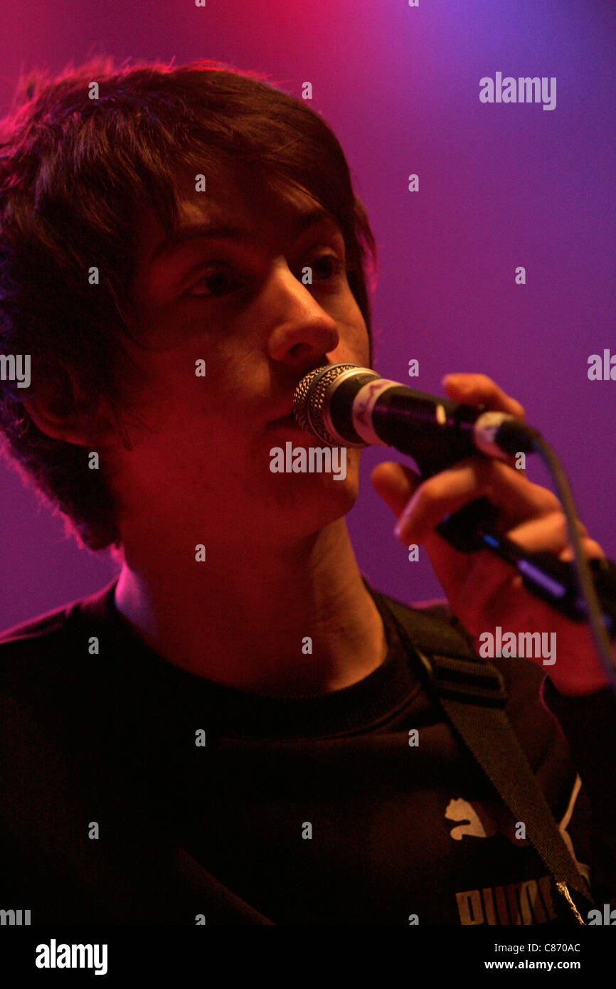 Alex Turner, singer with the Arctic Monkeys performs on stage at the ...