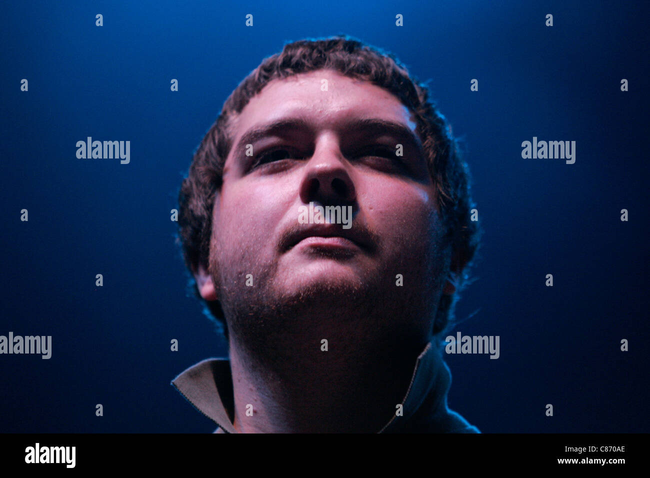 Andy Nicholson, bass guitar with the Arctic Monkeys performs on stage ...