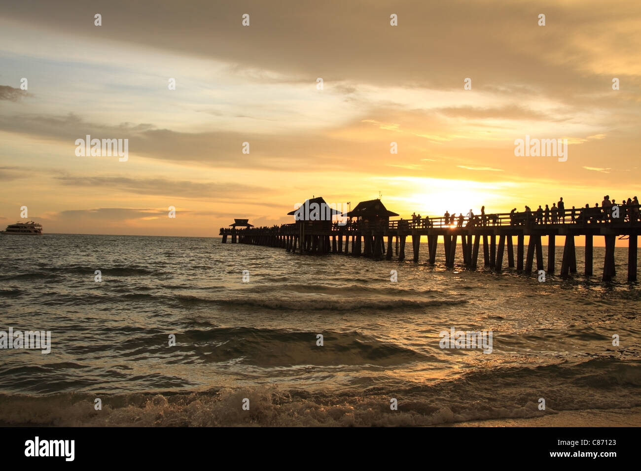 Sunset in Naples pier Stock Photo - Alamy