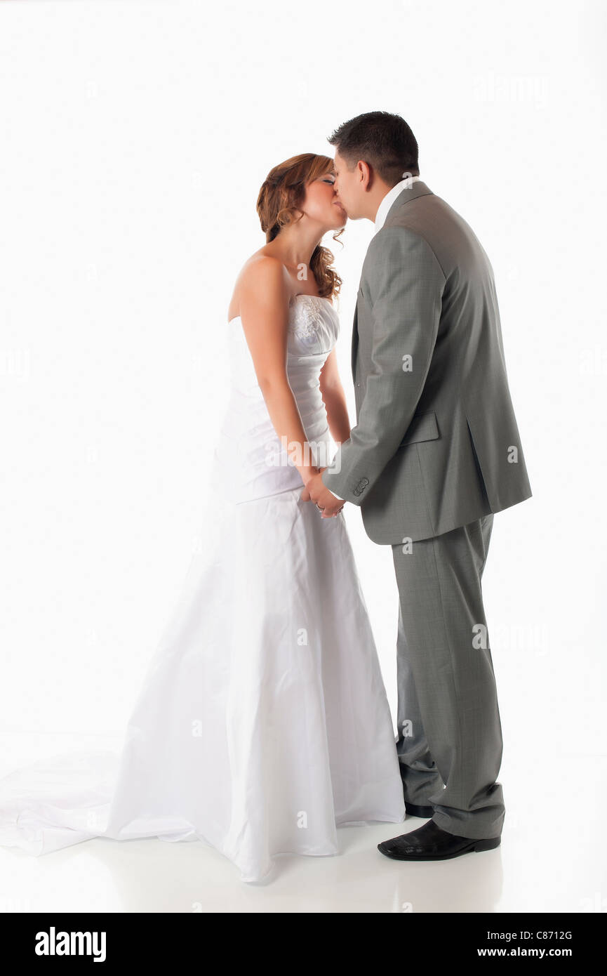 Bouquet between newlyweds hi-res stock photography and images - Alamy