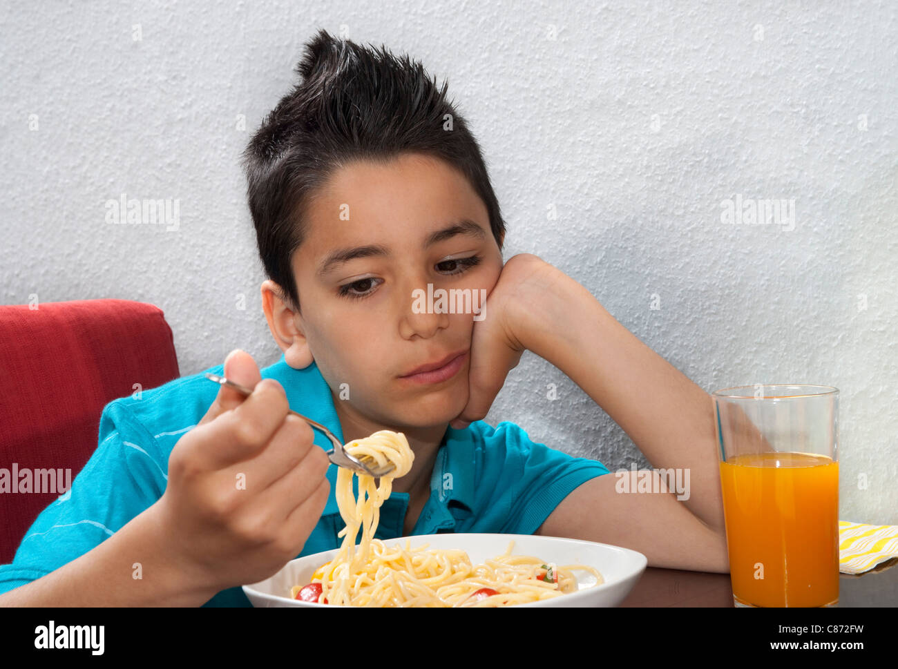 Boy Eating Pasta Stock Photo - Alamy