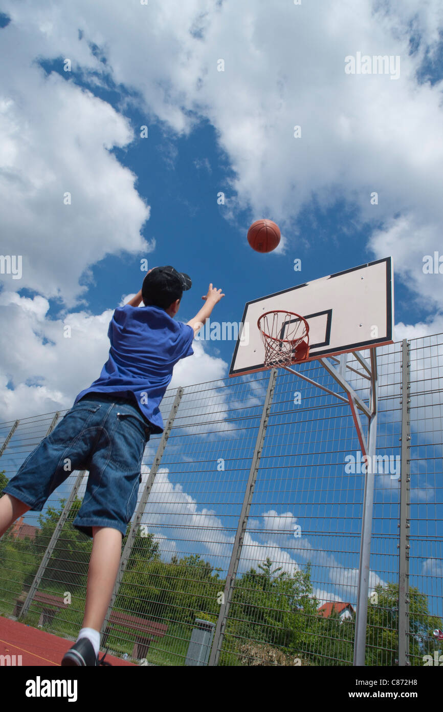 Boy Playing Basketball Stock Photo - Alamy