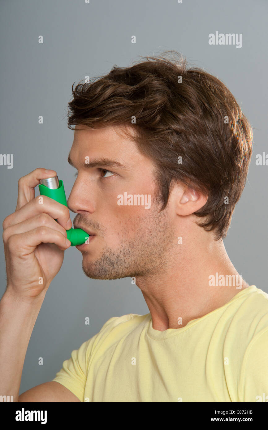 Man Using Inhaler Stock Photo - Alamy