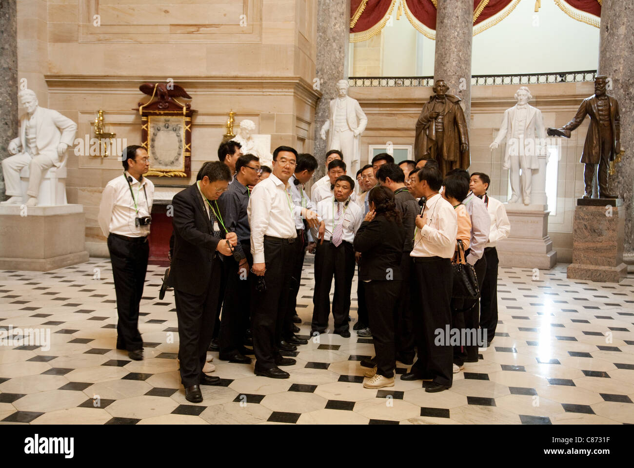 A group of asian tourists in the Rotunda, Capitol building Washington ...
