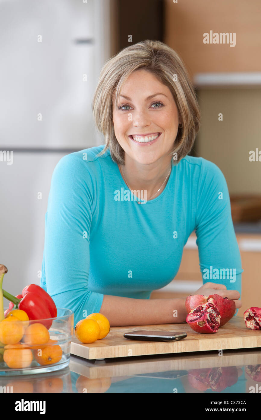 Woman in Kitchen Stock Photo - Alamy