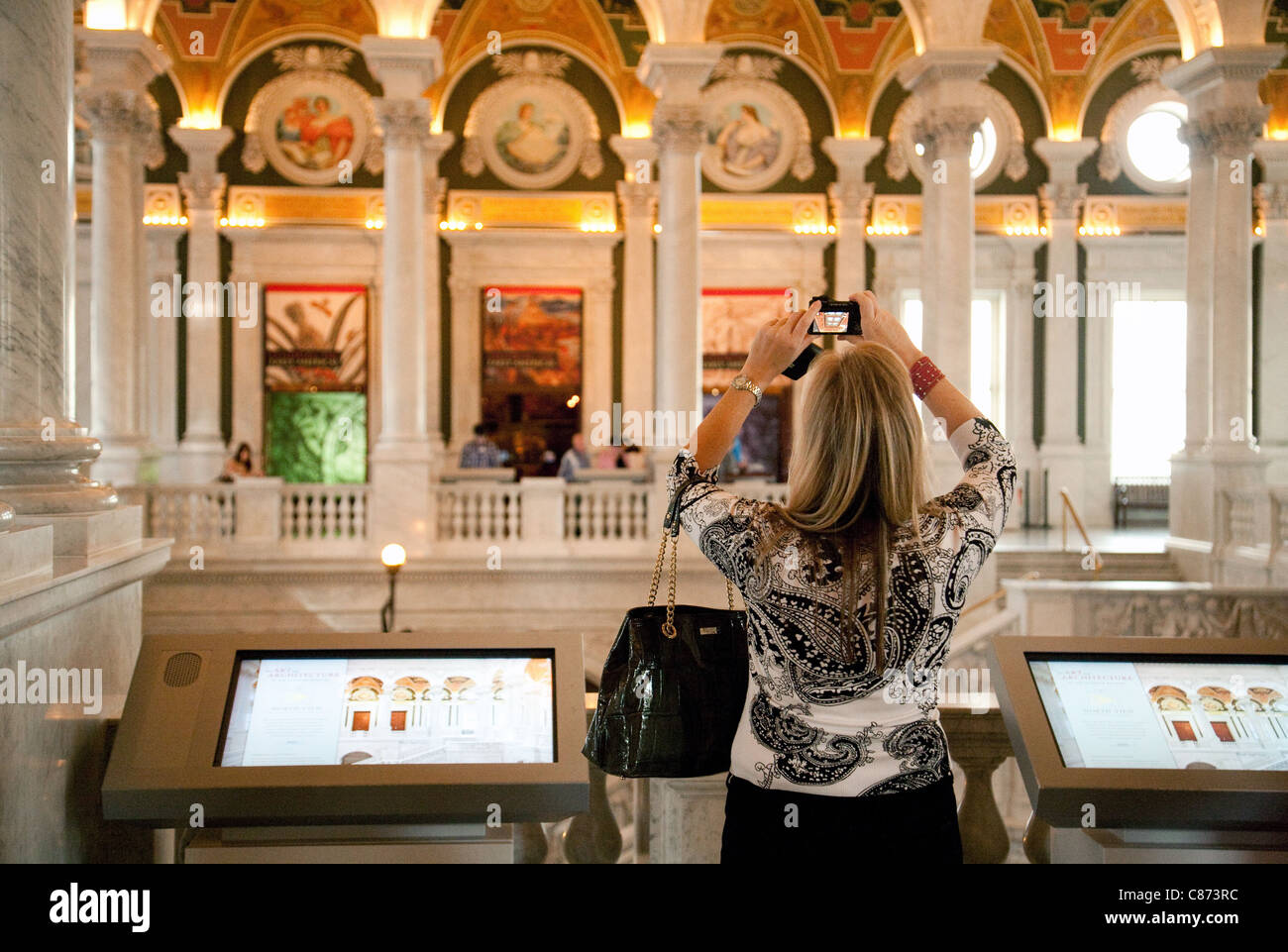 Visitor taking a photo inside the national Library of Congress ...