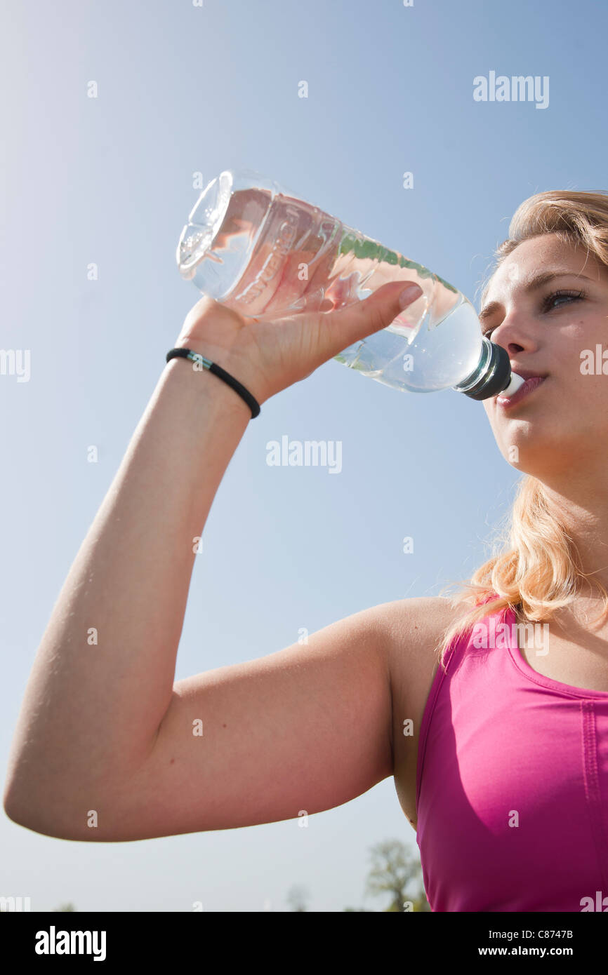 Young Woman Drinking Water Stock Photo - Alamy