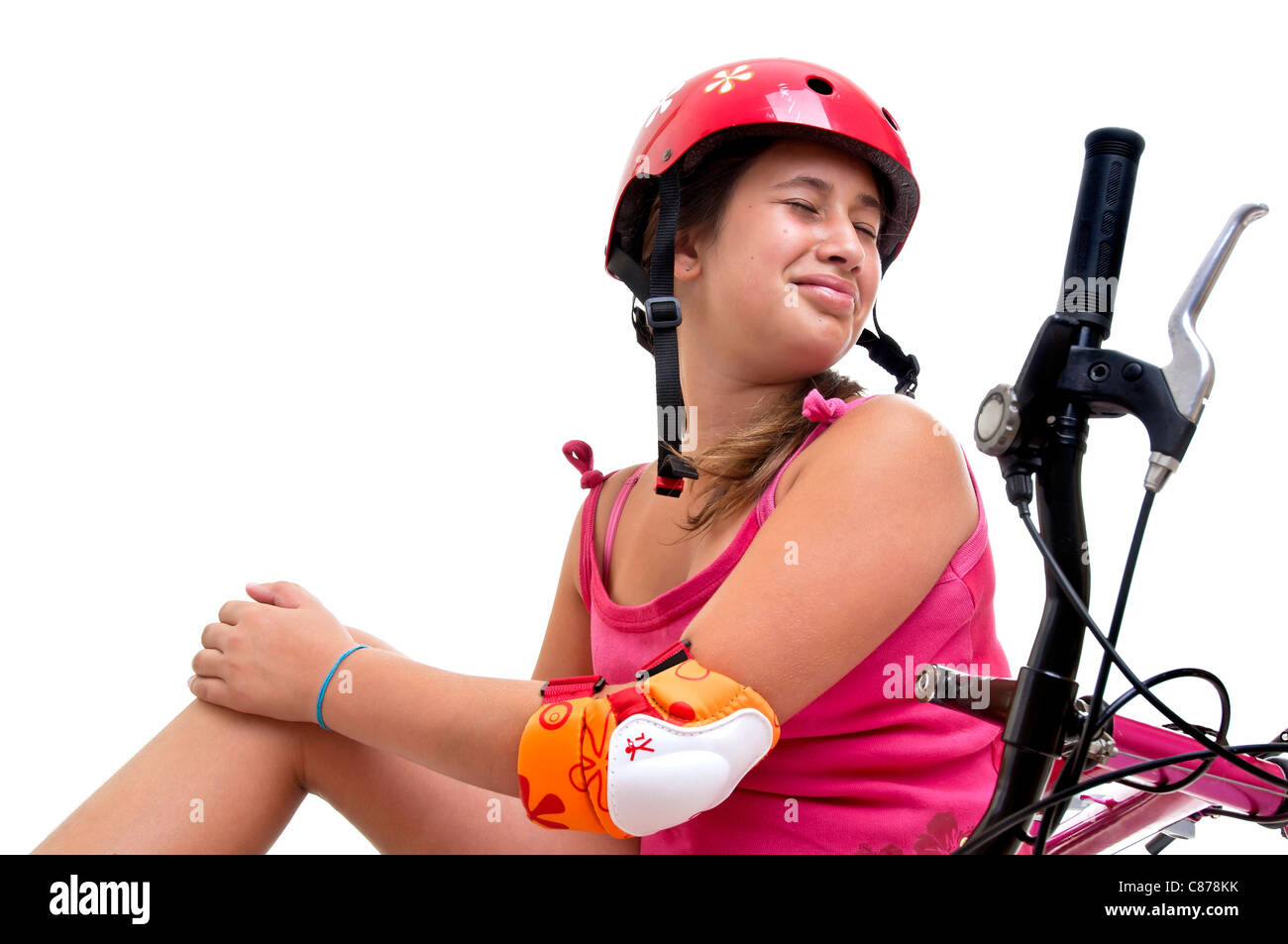 Beautiful young girl in a bicycle crash isolated in white Stock Photo ...