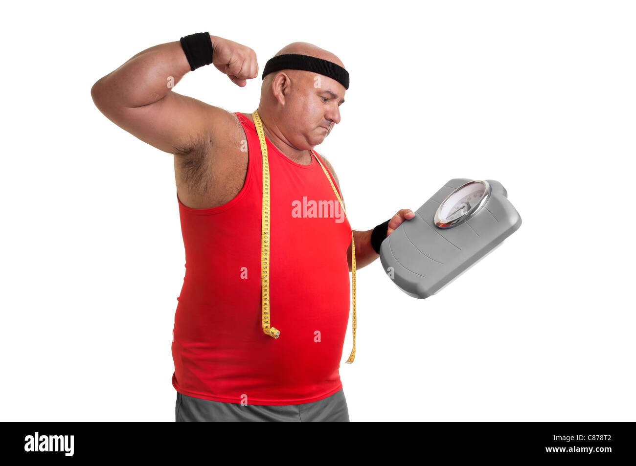 Large fitness man angry with weight scale isolated in white Stock Photo ...