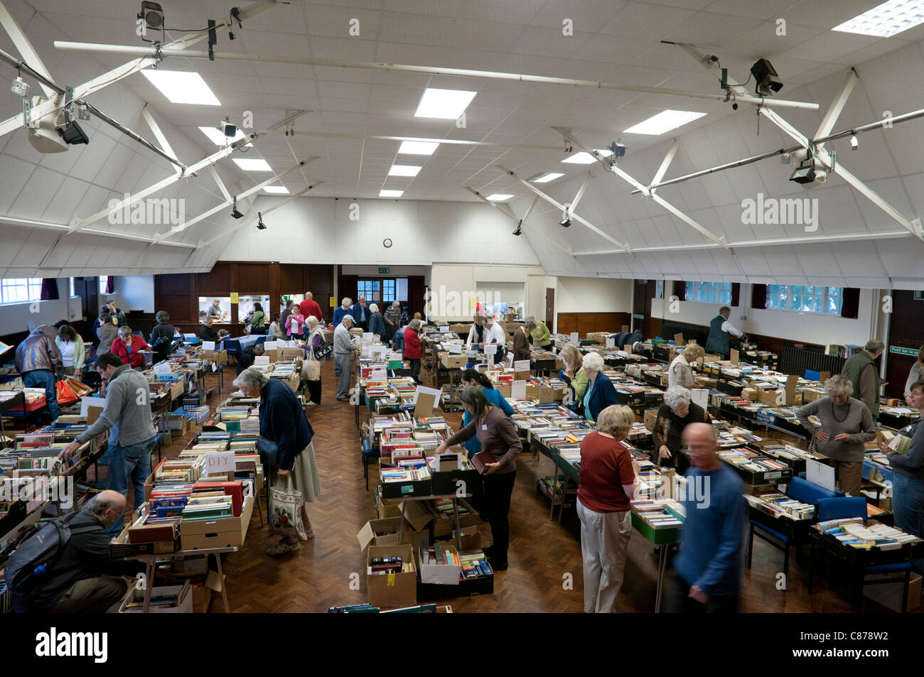 Charity book fair in a village hall in Surrey, UK Stock Photo - Alamy