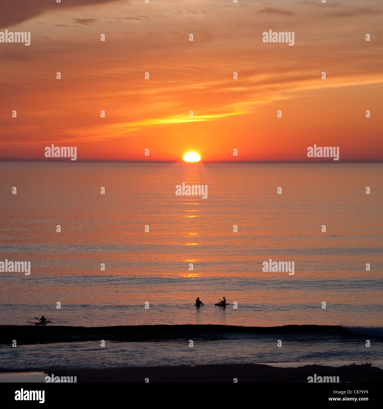 Sunset over the ocean Stock Photo - Alamy