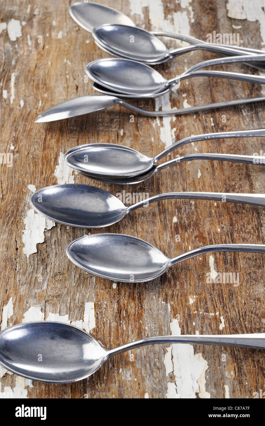 spoon on wood background Stock Photo - Alamy