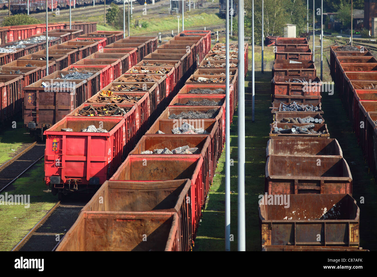 Freight depot, freight yard. Scrap metal in railway wagons, for melt ...