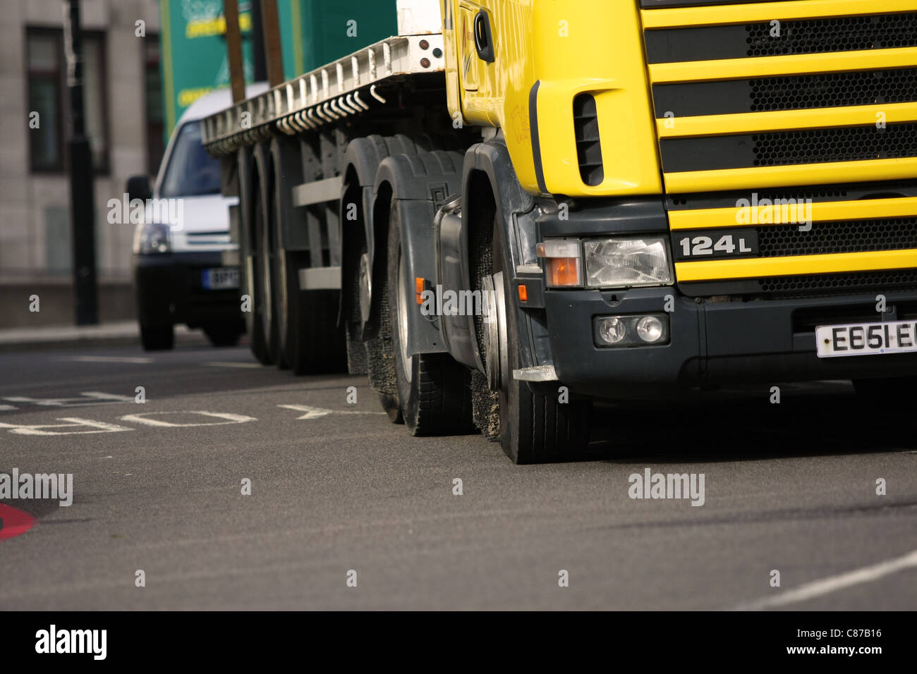 a low level view of truck wheels as it travels along a road Stock Photo ...