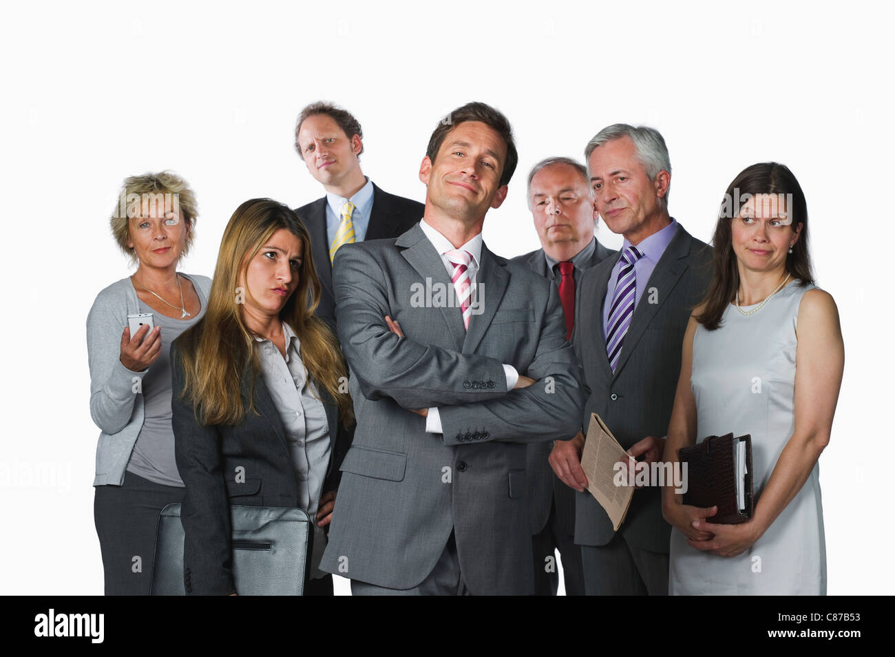 Business people with file, diary, mobile phone and newspaper against ...