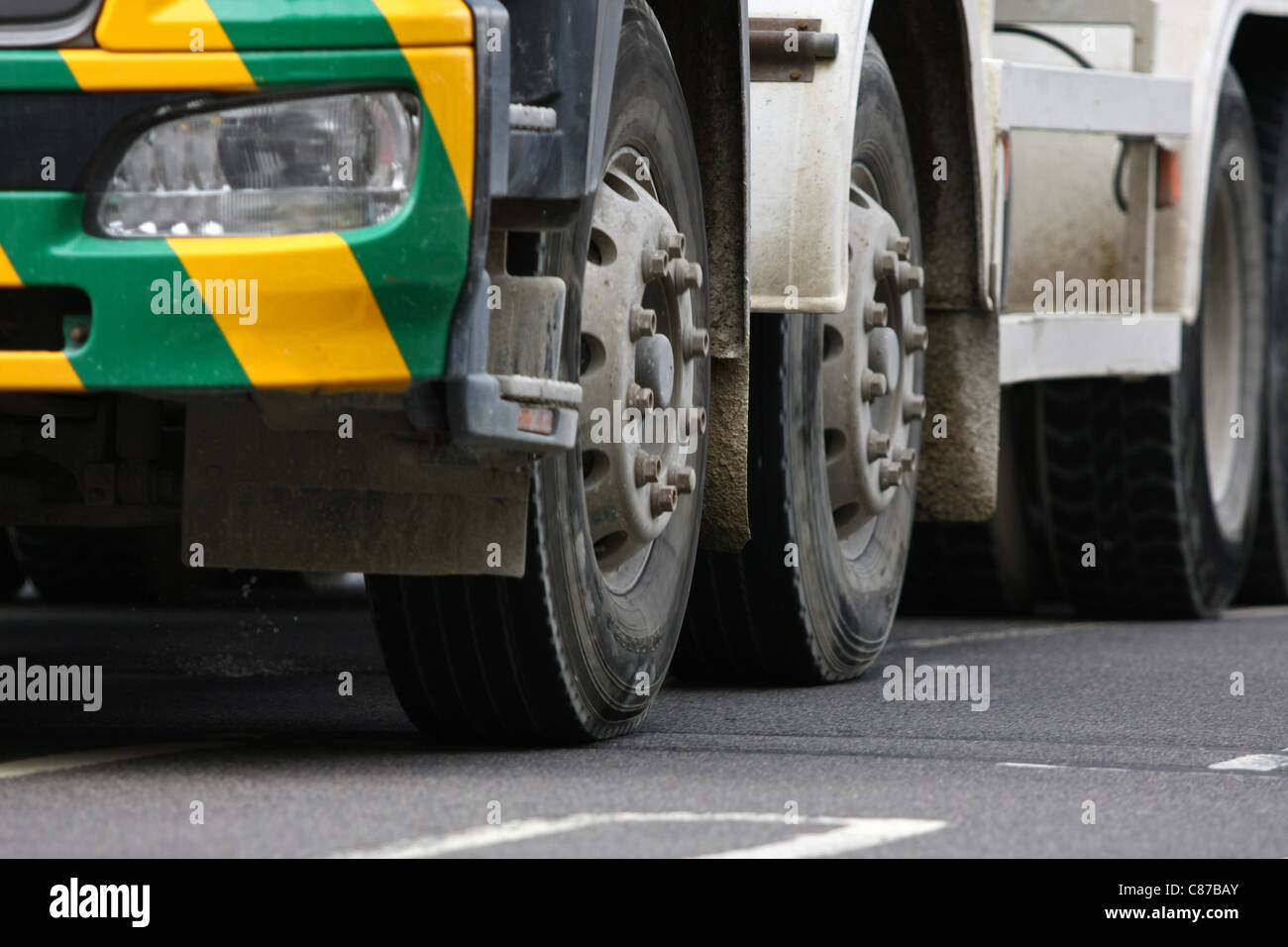 a low level view of truck wheels as it travels along a road Stock Photo ...