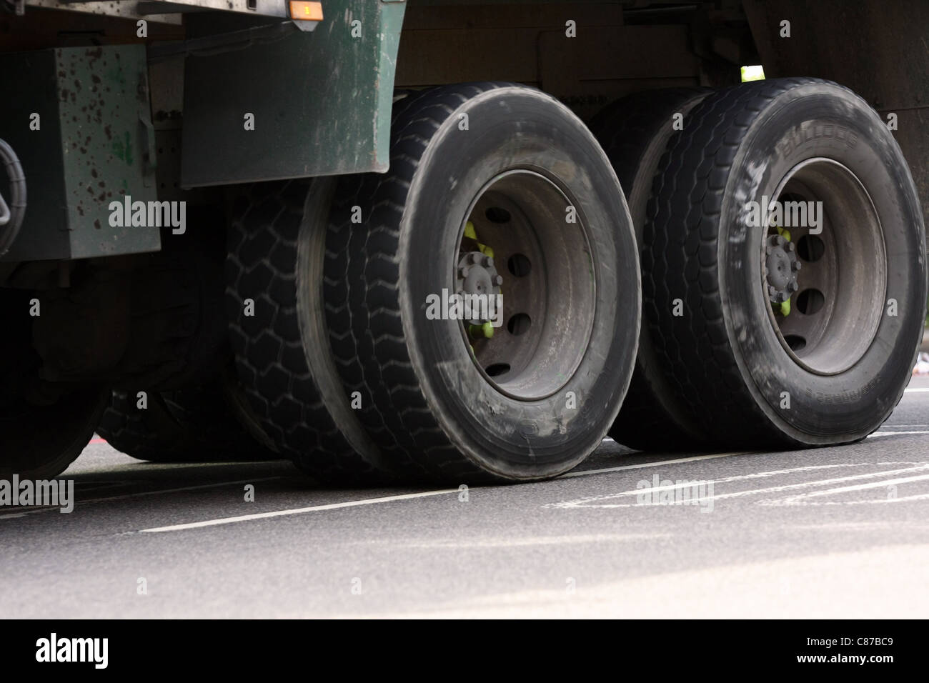 a low level view of the truck wheels as it travels along a road Stock ...