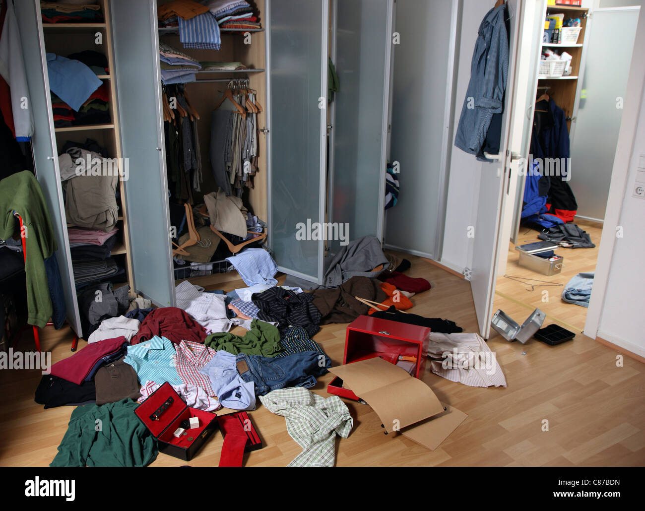 Burglar in a private house. Daylight burglary. Breaking into a house ...