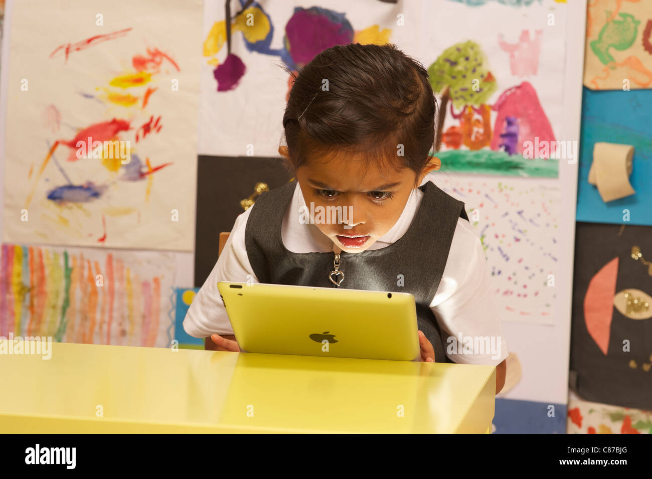 A young girl with ipad 2 Stock Photo - Alamy