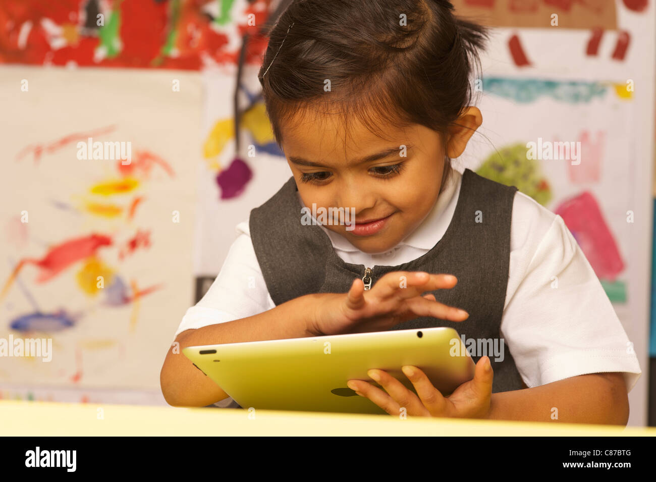 Child using ipad, smile hi-res stock photography and images - Alamy