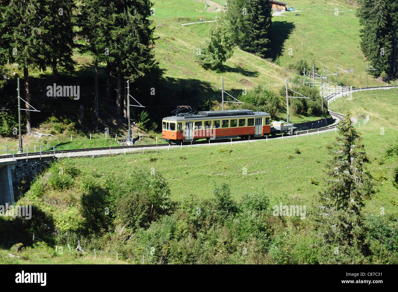 Picturesque scene with train on the Grutschalp to Murren railway ...