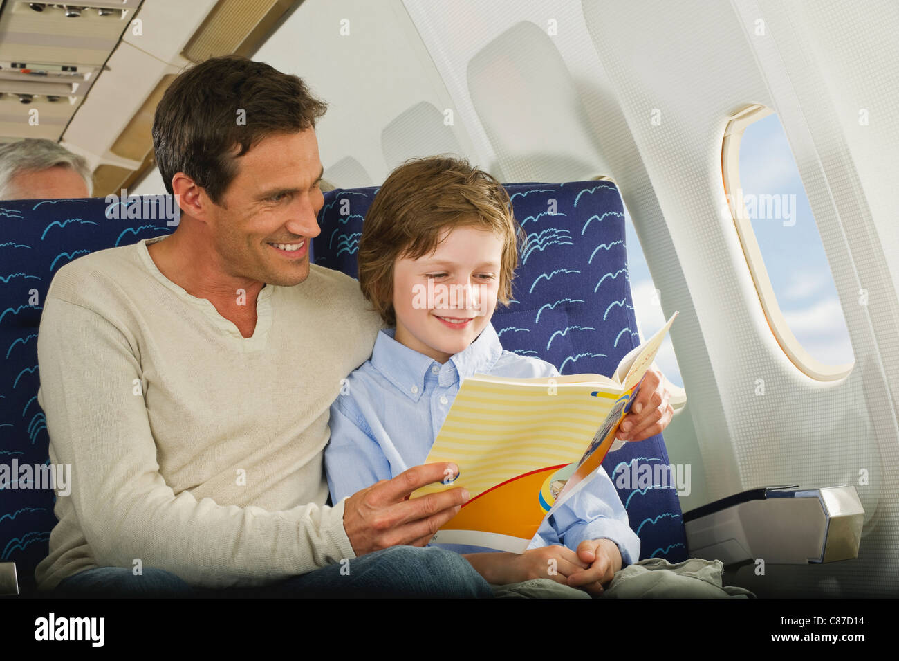 Blond man airplane seat hi-res stock photography and images - Alamy