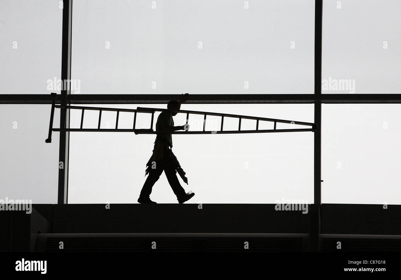 Silhouette of a window cleaner after work Stock Photo - Alamy