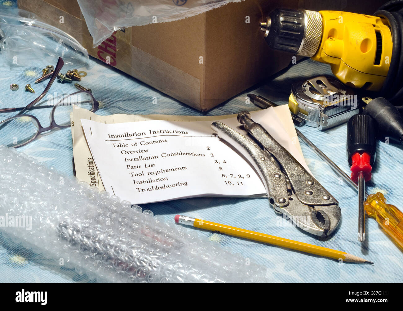 amateur tools with instruction booklet Stock Photo - Alamy