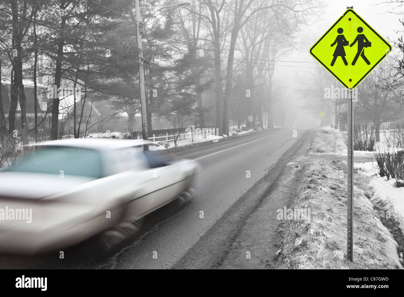 Car speeding in a school zone Stock Photo - Alamy
