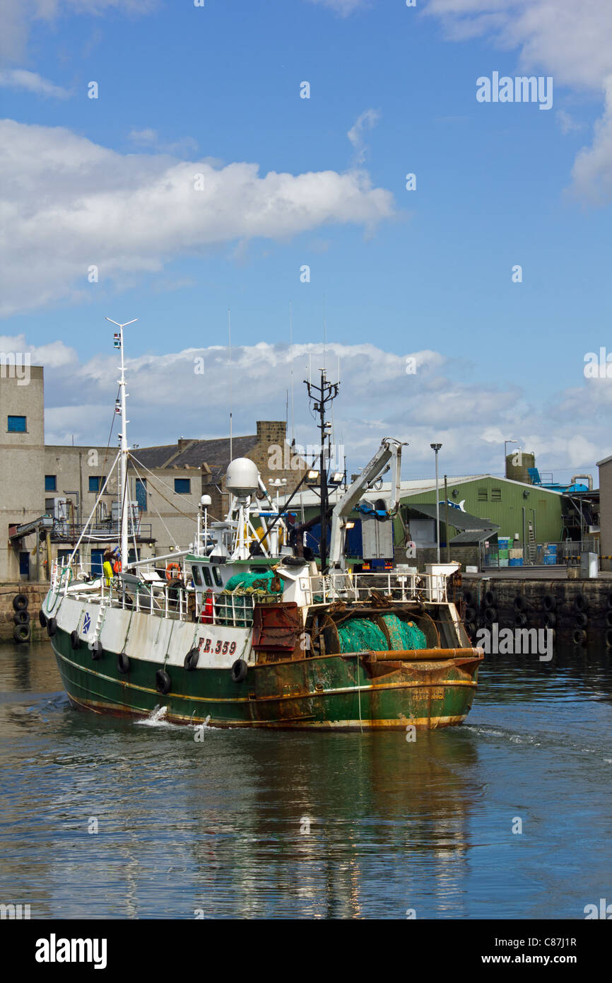 FISHING BOAT IN HARBOUR Stock Photo - Alamy