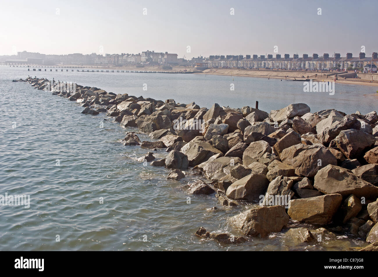 Rock armour protecting the town of Lowestoft from coastal erosion ...