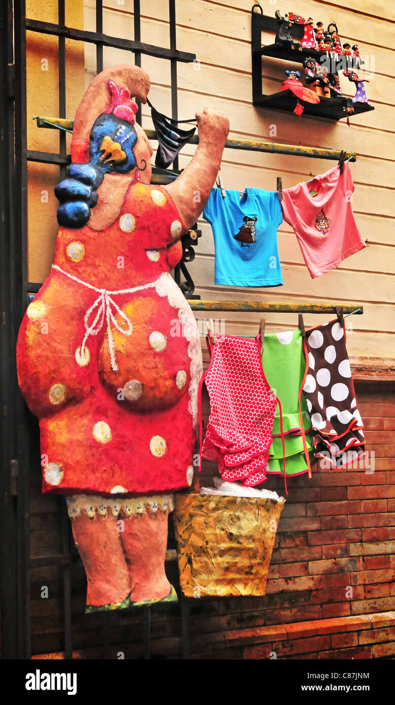 Seville Souvenir Shop Display with Comic Woman in Spain Stock Photo - Alamy