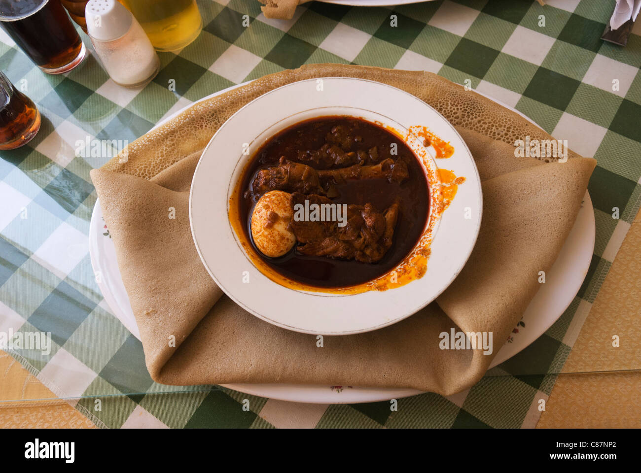 Elk200-2687 Ethiopia, Axum, Ethiopian food, doro wat and injera Stock ...