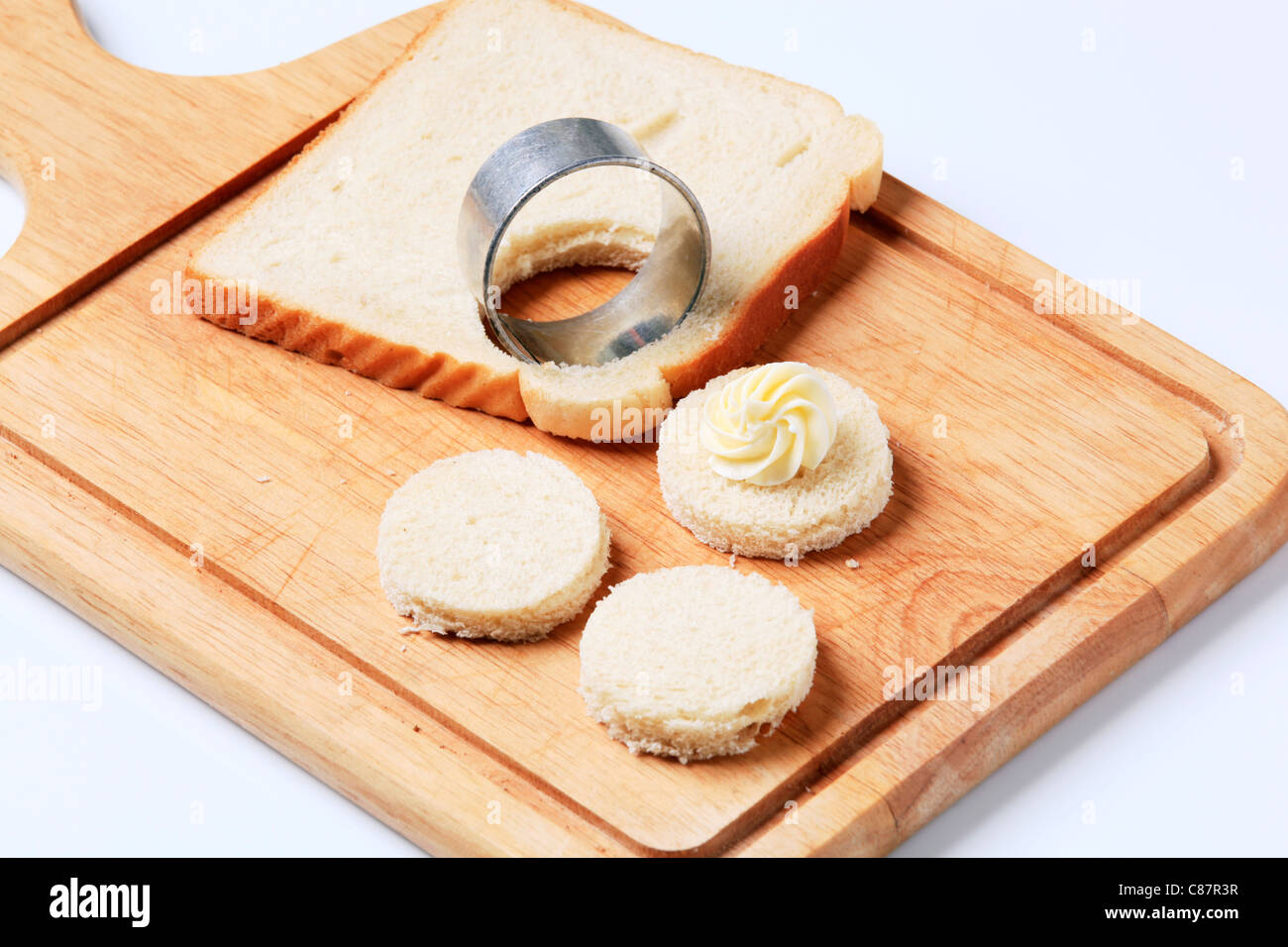 White bread cut into circles with a pastry cutter Stock Photo - Alamy