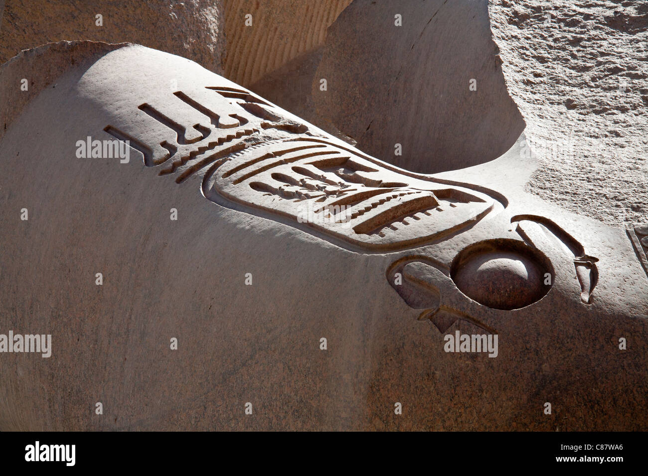 Close up of the shoulder of the fallen colossus of Ramesses II at the ...