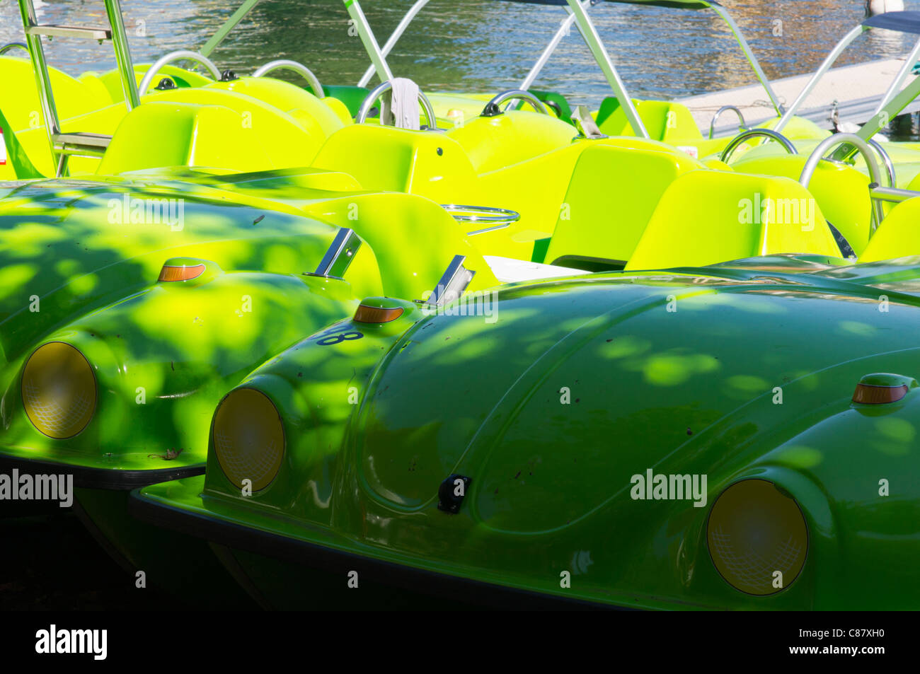 Bright green pedalos Stock Photo - Alamy