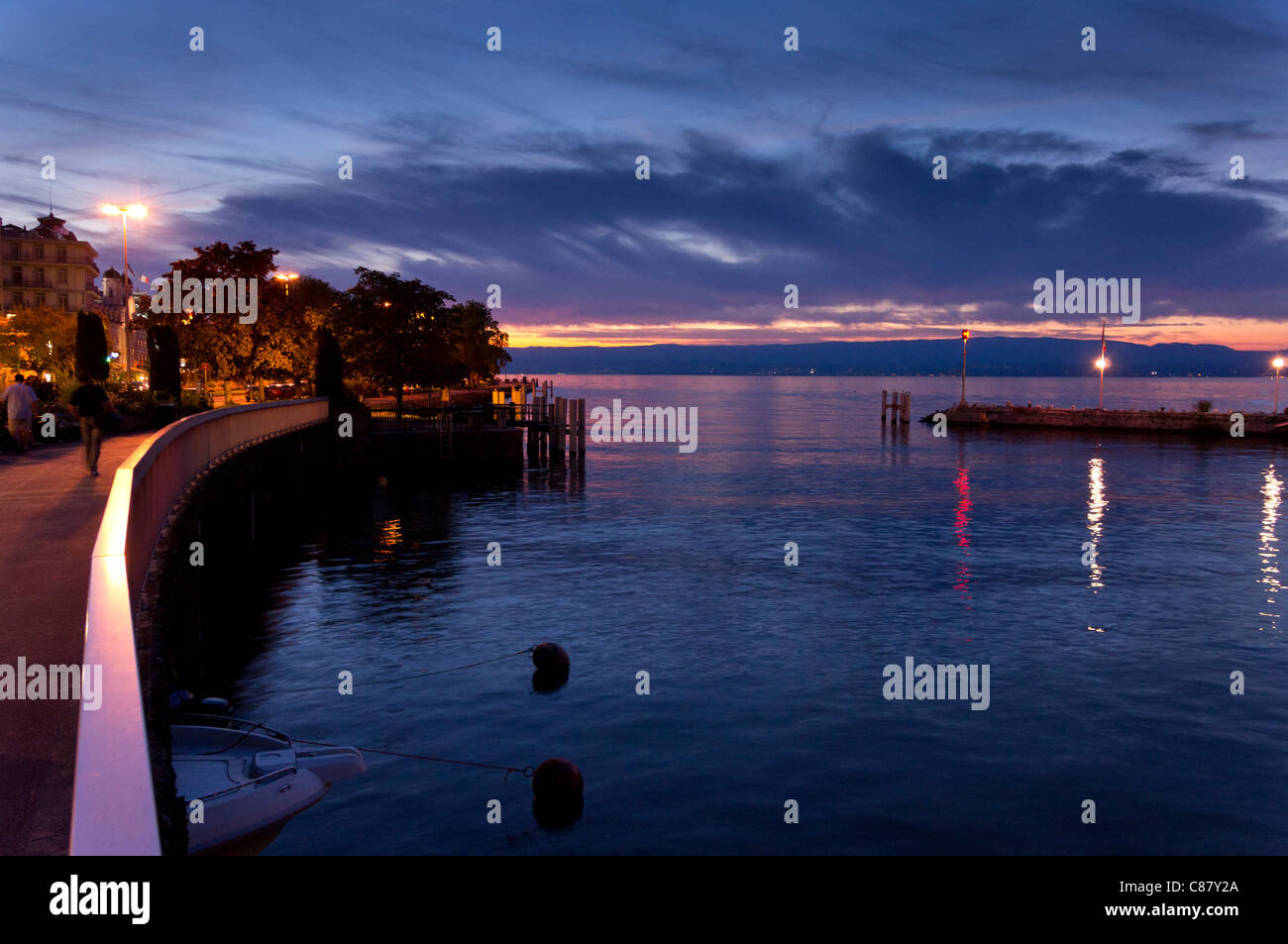 Sunset on the promenade alongside Lake Geneva at Evian Stock Photo - Alamy