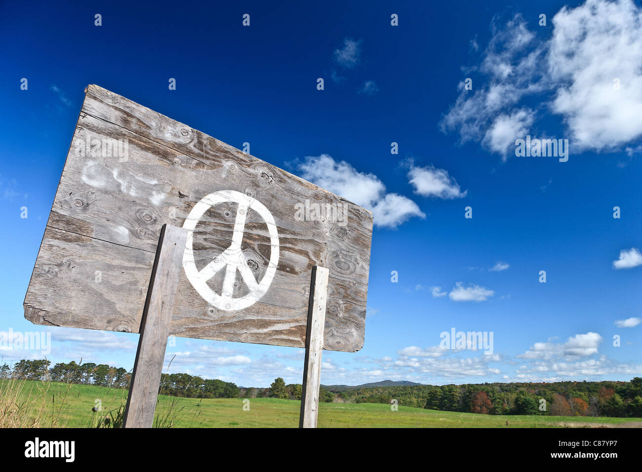 Peace sign painted on back of road sign Maine Stock Photo - Alamy