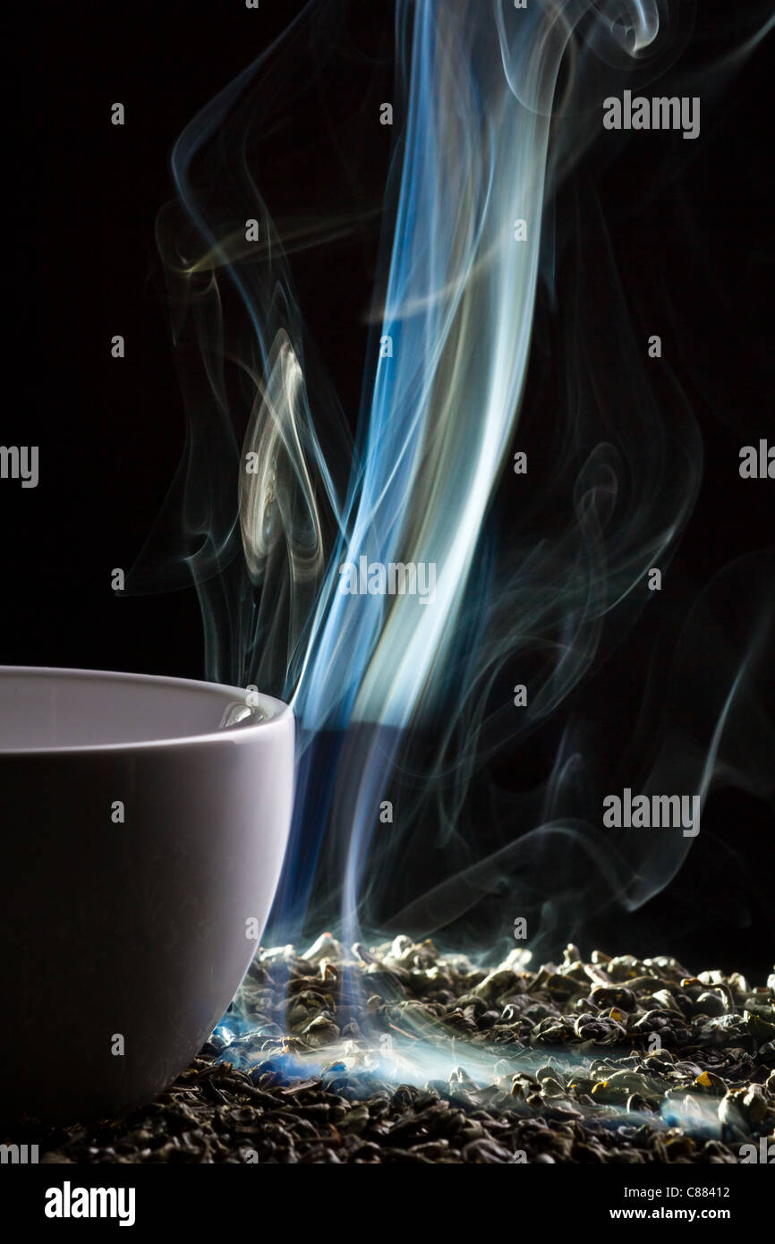 Blue smoke from cup of tea Stock Photo - Alamy