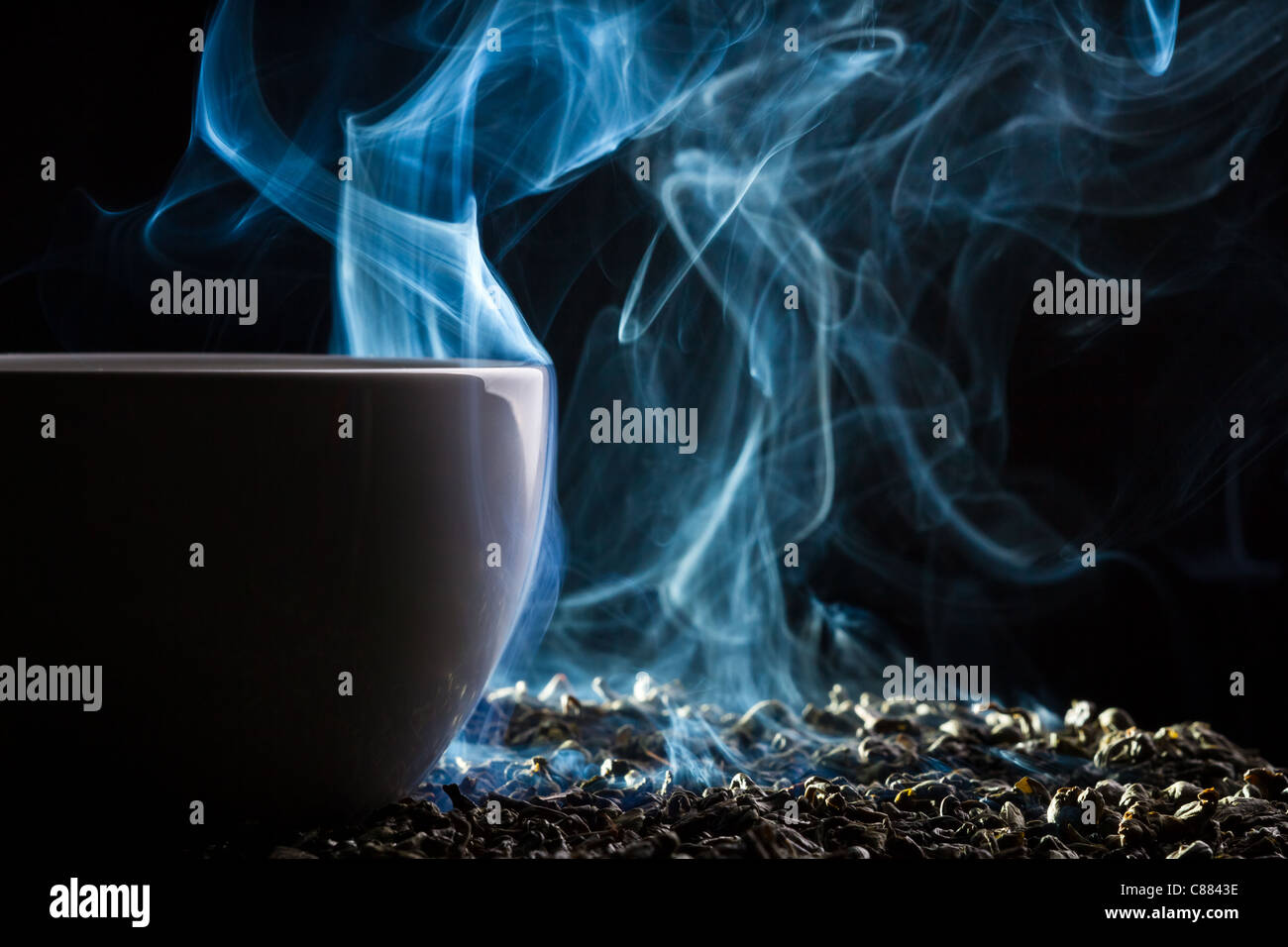 Smell of good tea from a small cup Stock Photo - Alamy