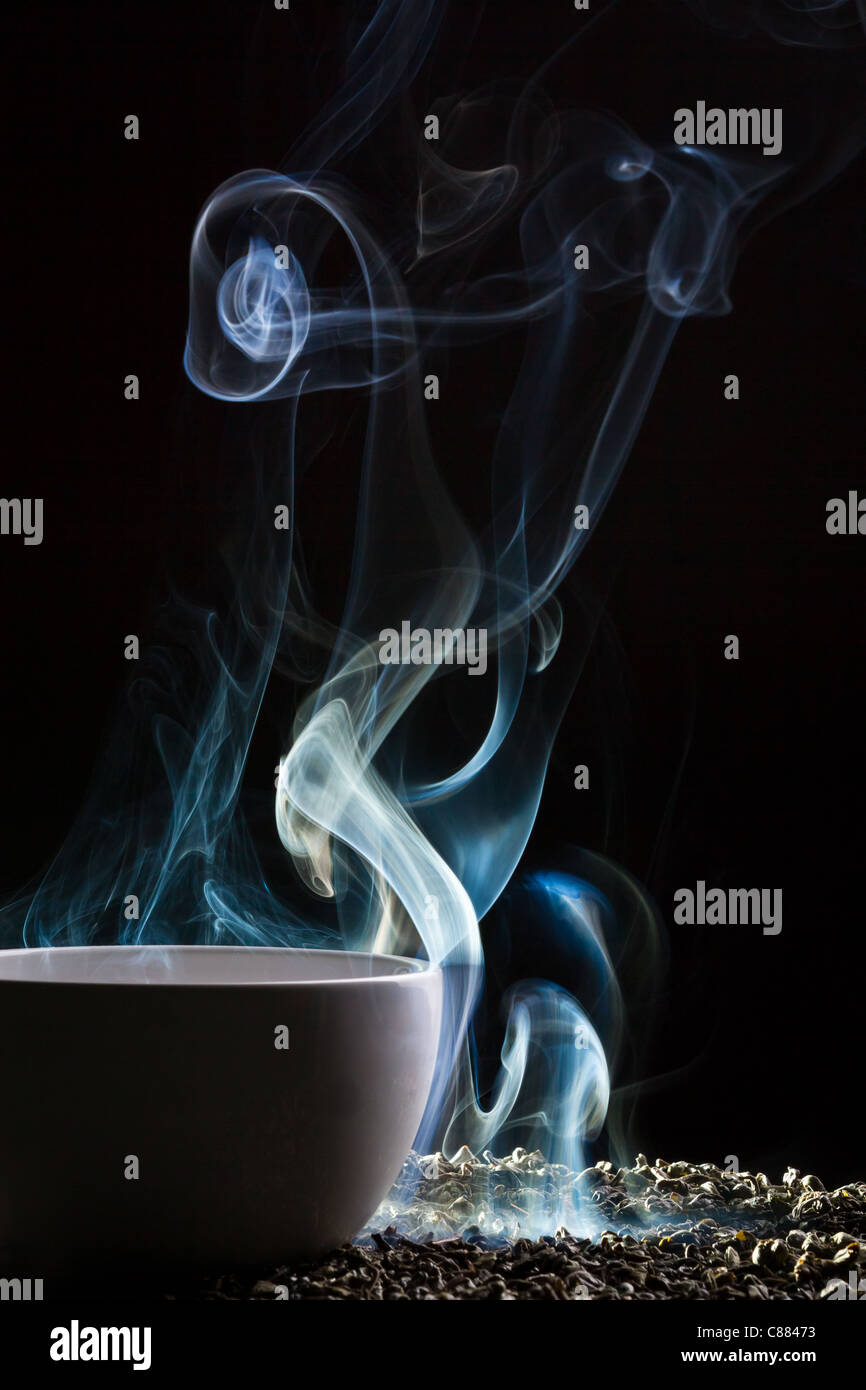 Strange blue smoke taking away from tea Stock Photo - Alamy
