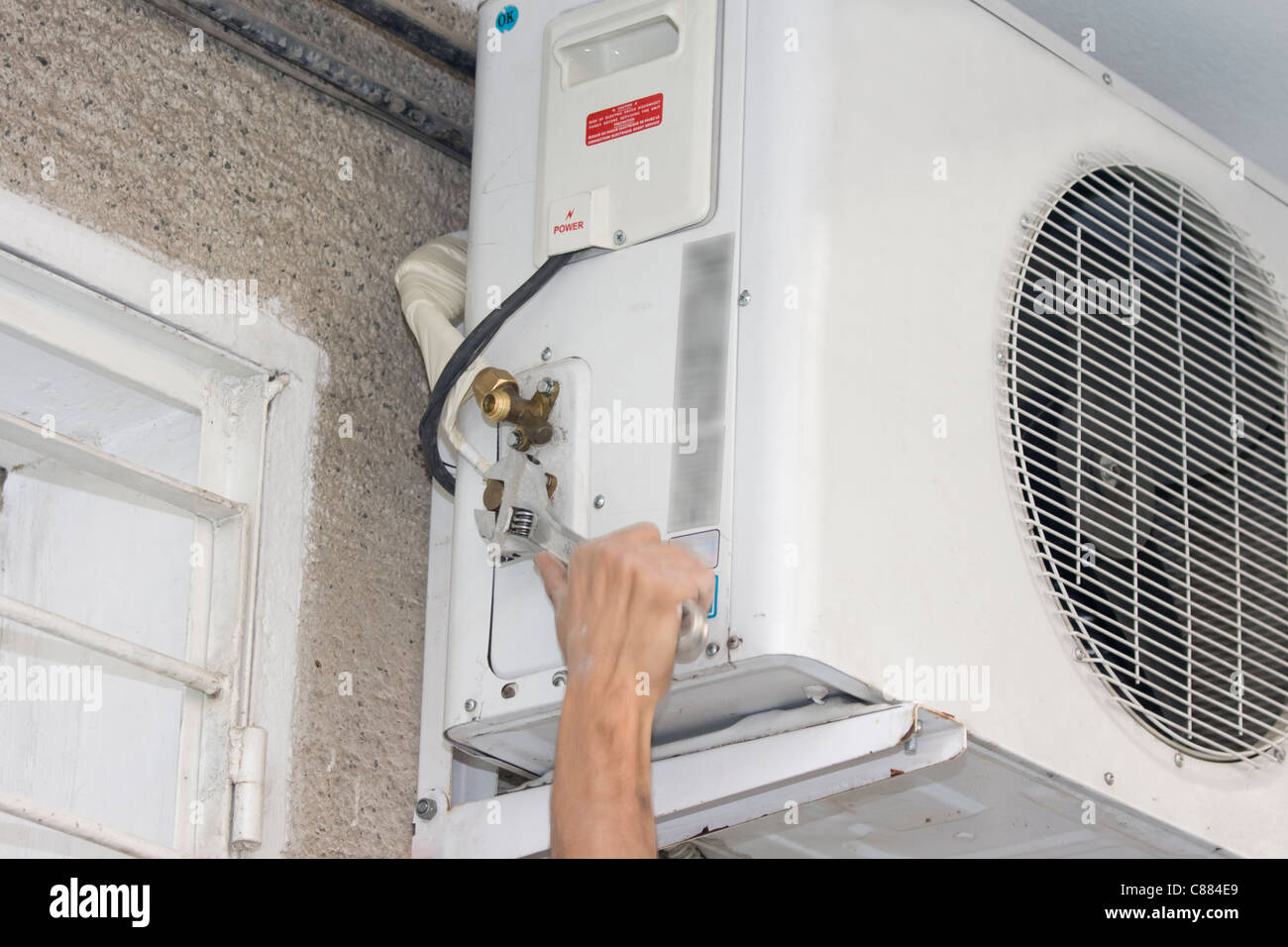 testing A residential central air conditioning unit Stock Photo - Alamy