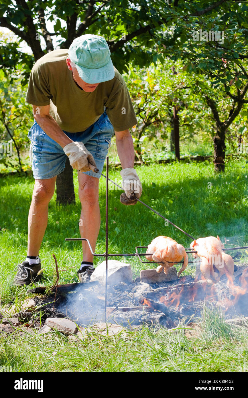 Man with chickens hi-res stock photography and images - Alamy