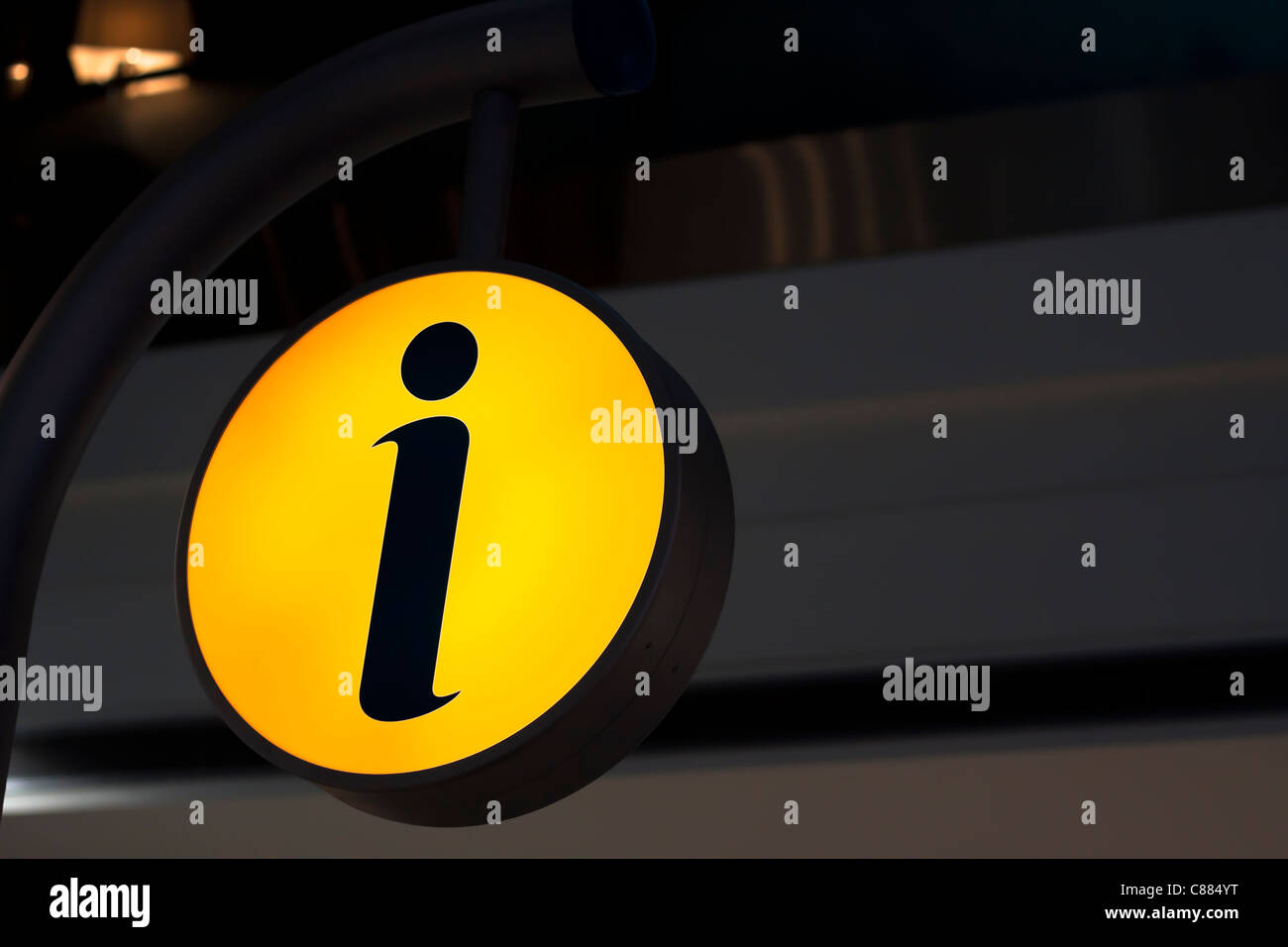 Glowing sign on dark background with the letter i as a symbol for ...