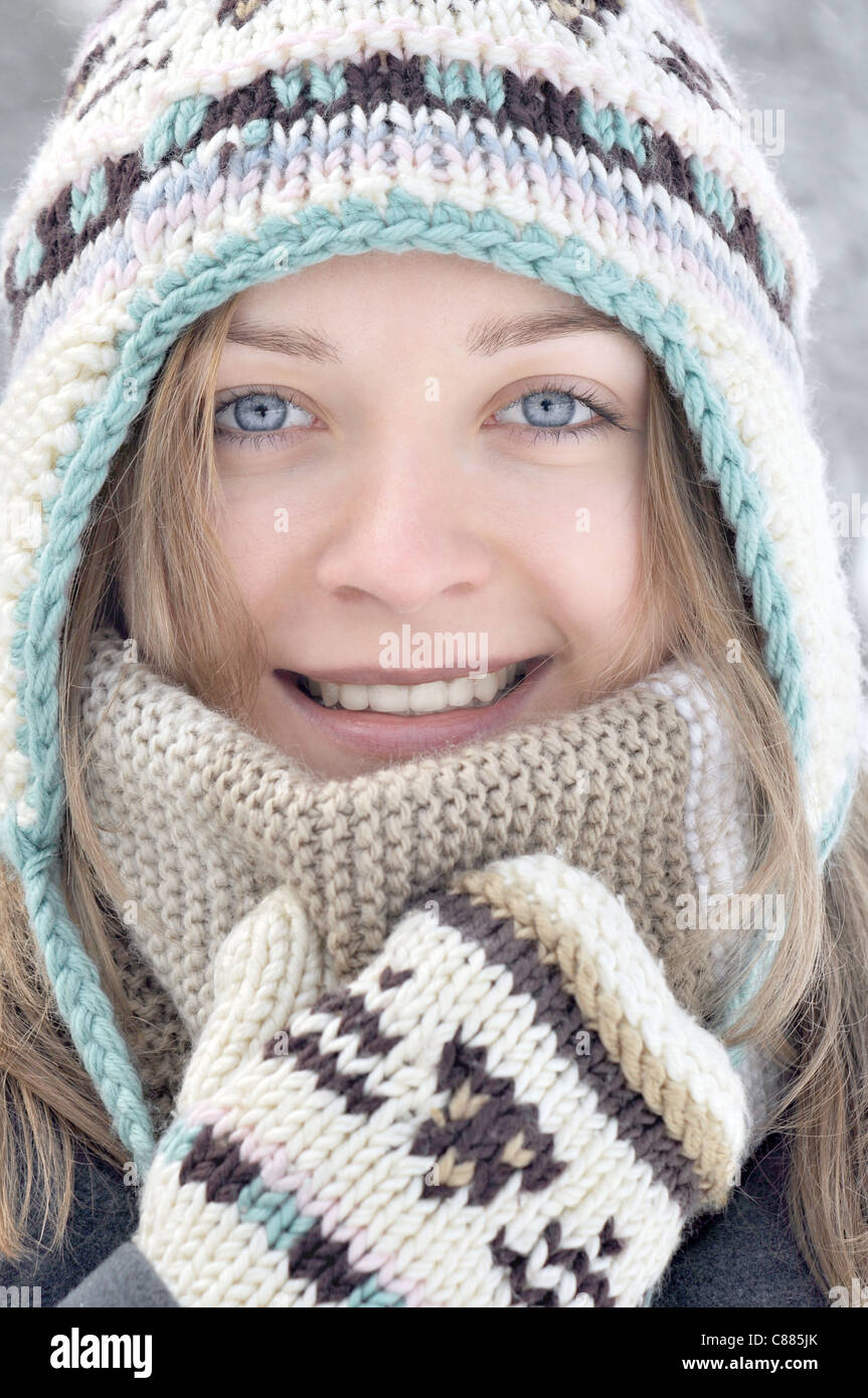 Portrait of young smiling winter woman Stock Photo - Alamy