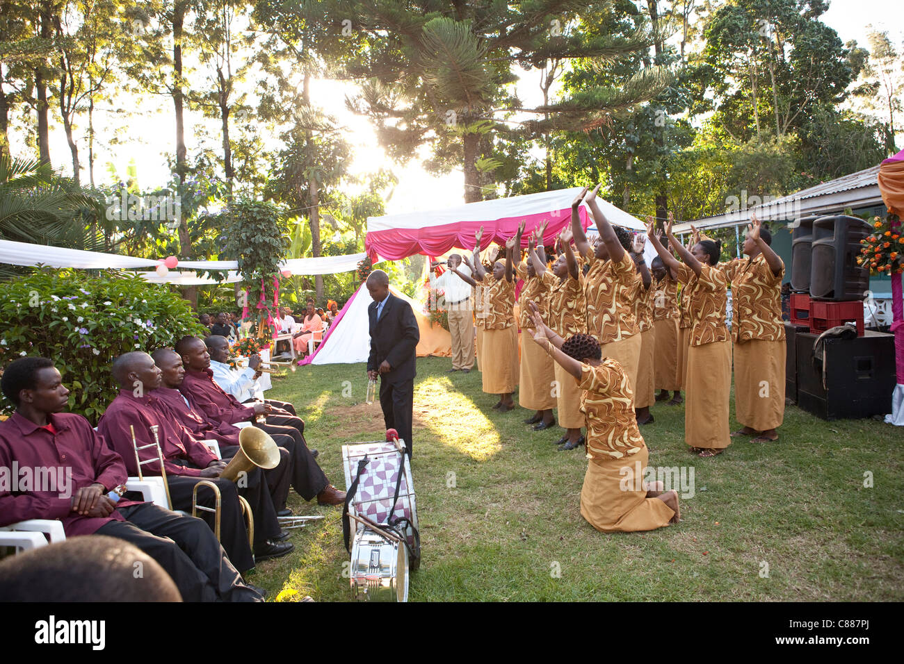 A church choir sings at a wedding outside of Arusha, Tanzania, East ...