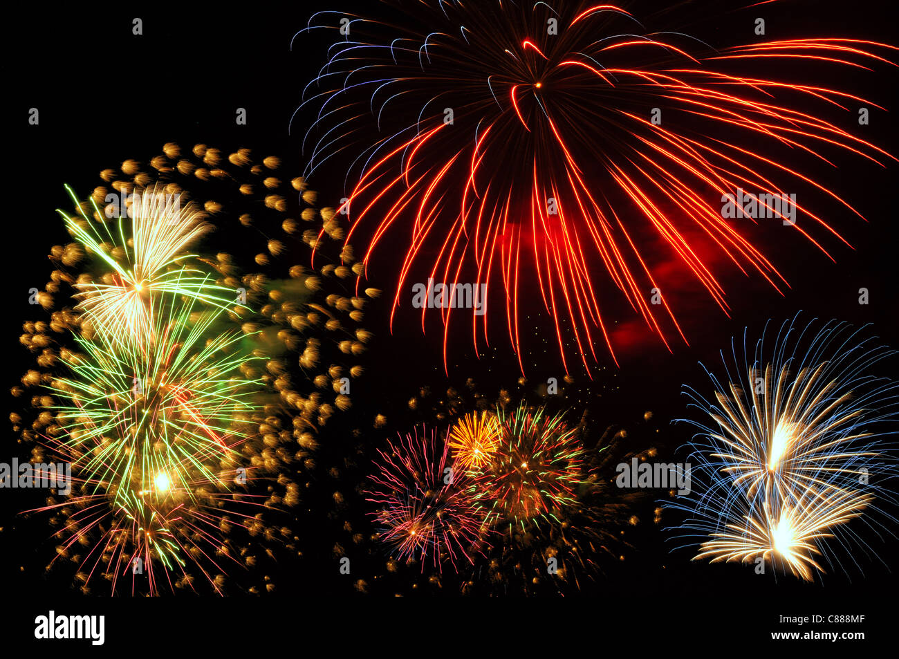 Colorful fireworks filling the night sky Stock Photo - Alamy